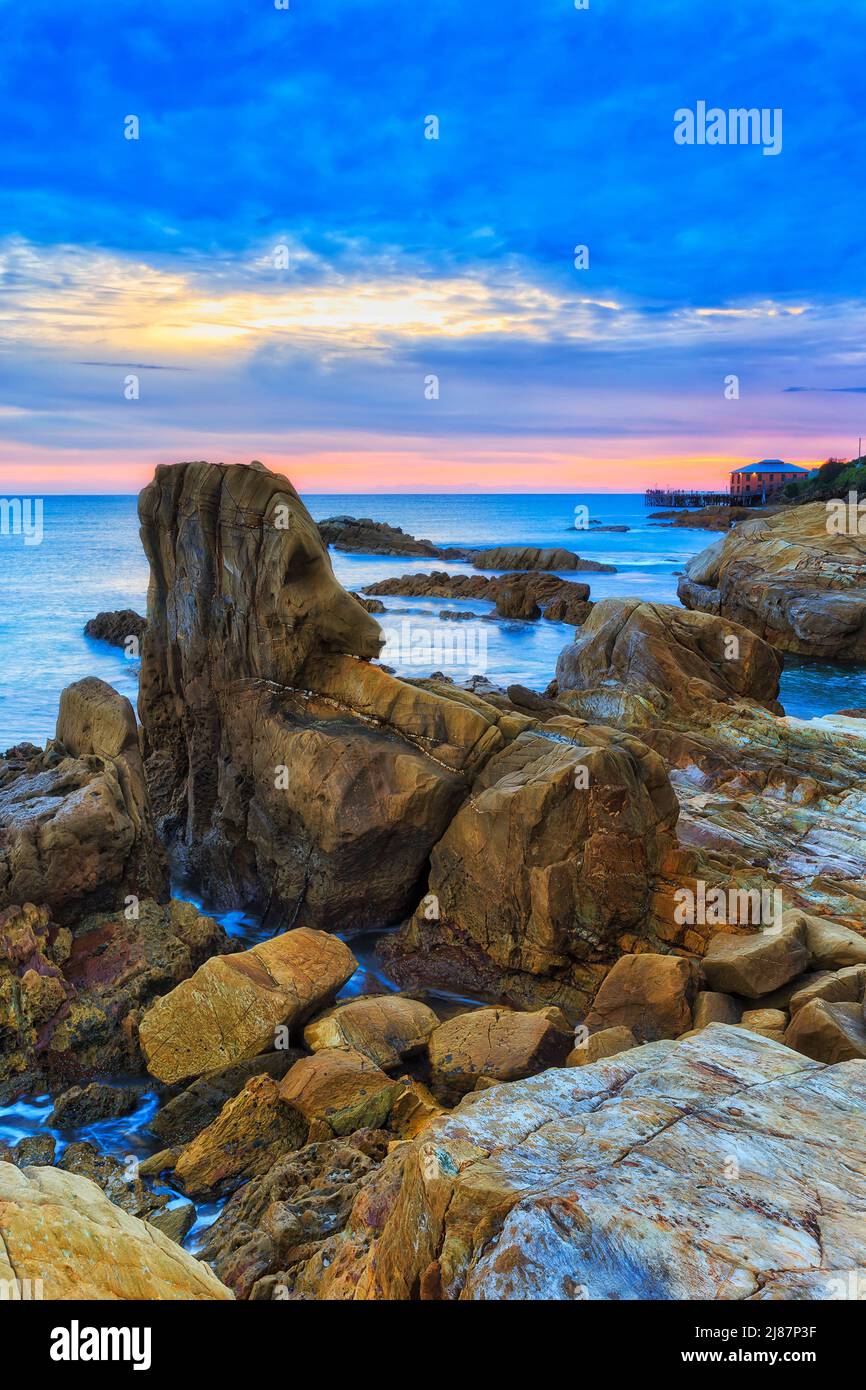 Shaped boulder rock on Tathra beach waterfront near historic Tathra ...
