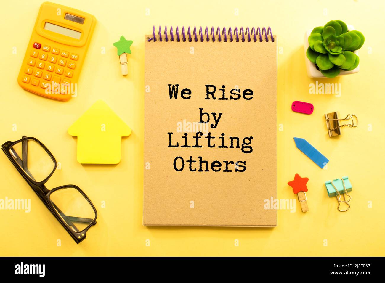 We rise by lifting others hi-res stock photography and images - Alamy