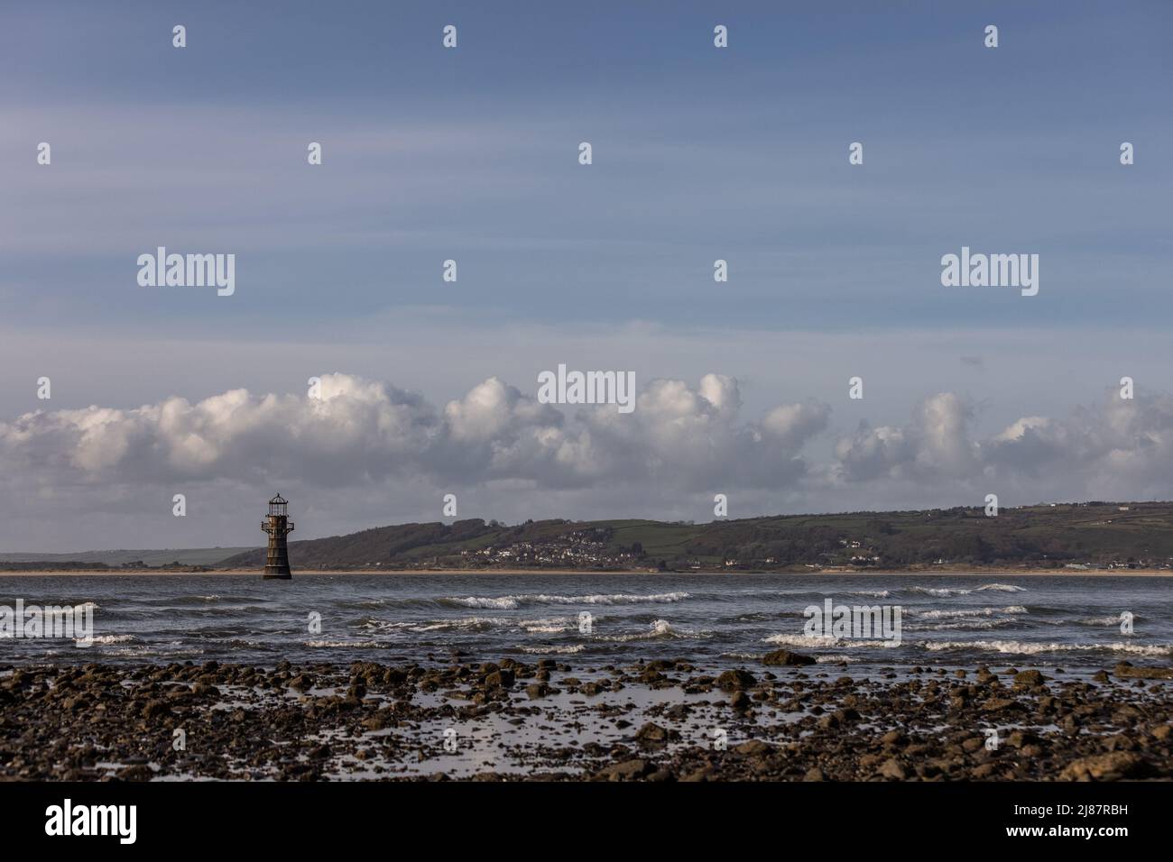 Whiteford lighthouse on the coast of the Gower peninsula in South Wales ...