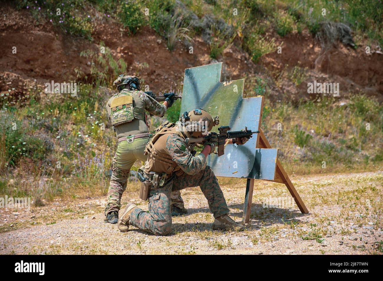 U.S. Marine Corps Cpl. Ryan Brousseau, right, from Tuscaloosa, Alabama ...