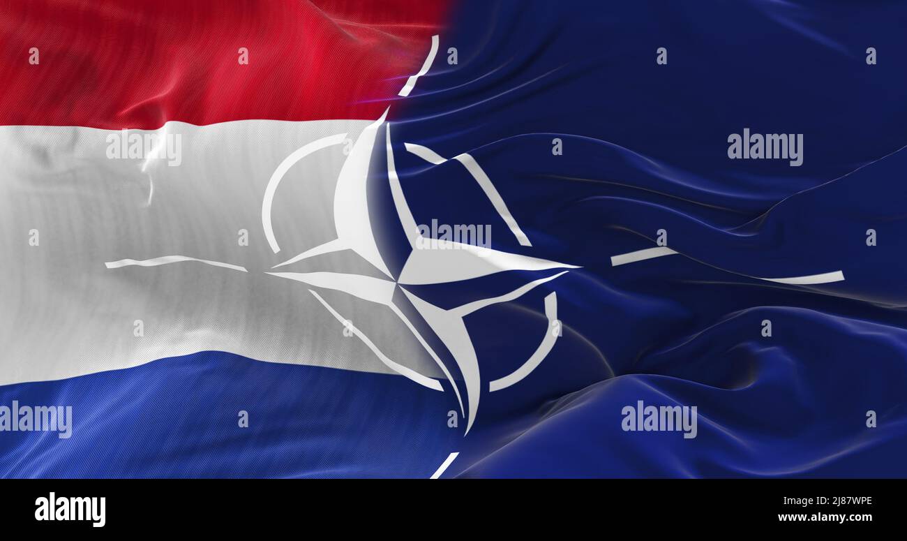 Minsk, Belarus - May, 2021: flag of Netherlands and NATO at cloudy sky ...