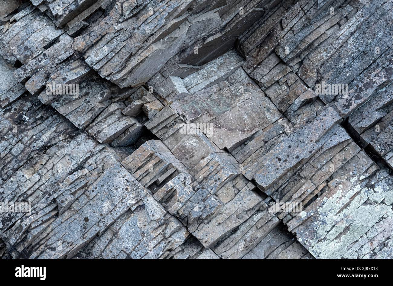 The rocks are colorful rock formations that have been deposited over ...