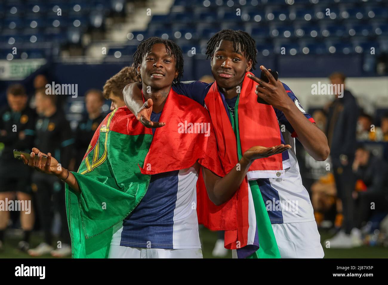 Mo Faal #40 of West Bromwich Albion and Quevin Castro #32 of West ...