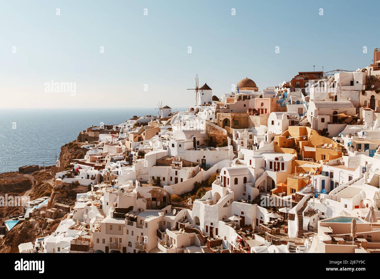 Santorini view. Oia village on sunset. White buildings architecture ...