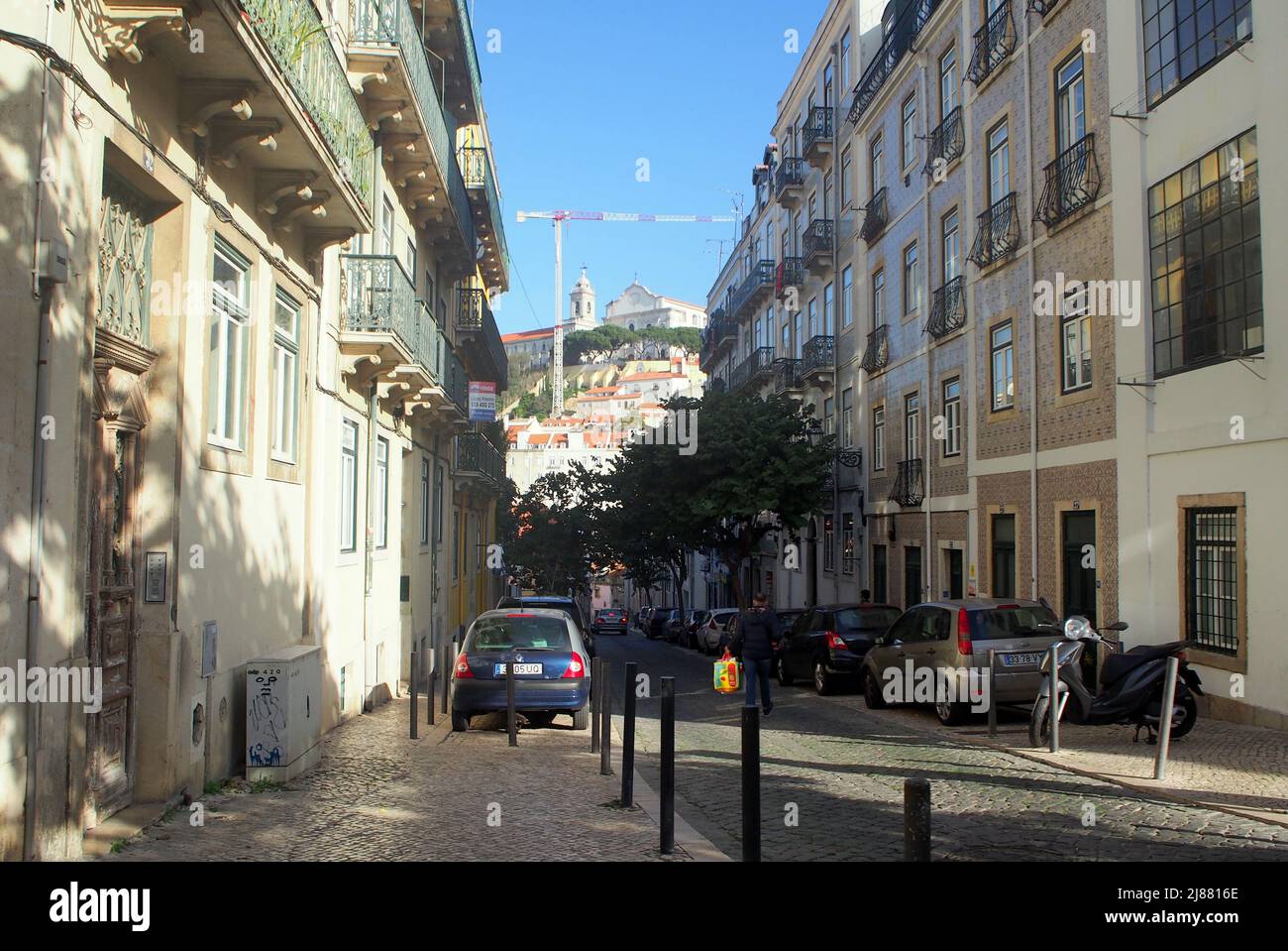 Street scene at Rua Marques Pte. de Lima, view of Miradouro da Graca in ...