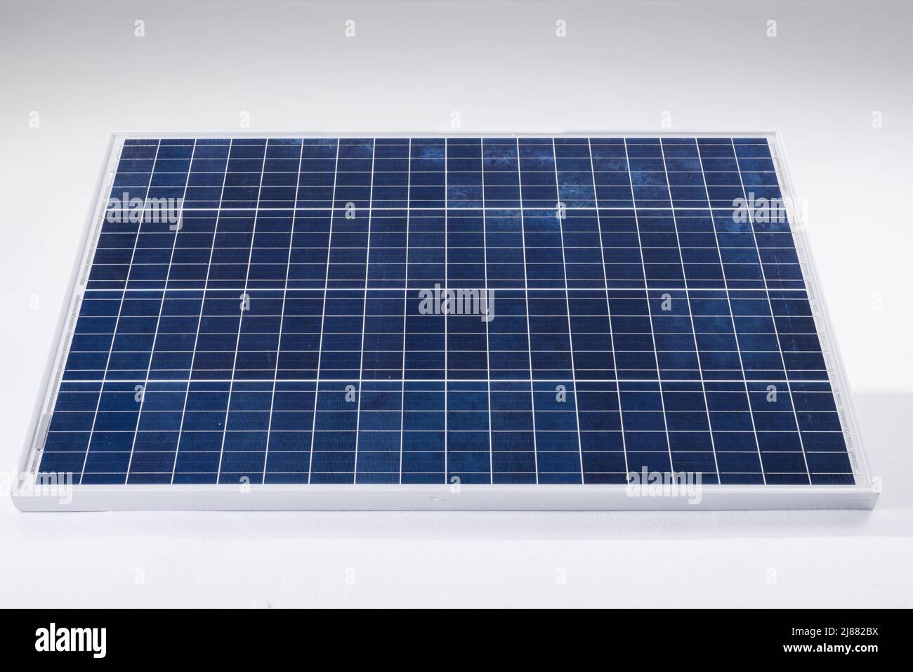 High angle view of blue solar panel with grid patterns isolated over ...