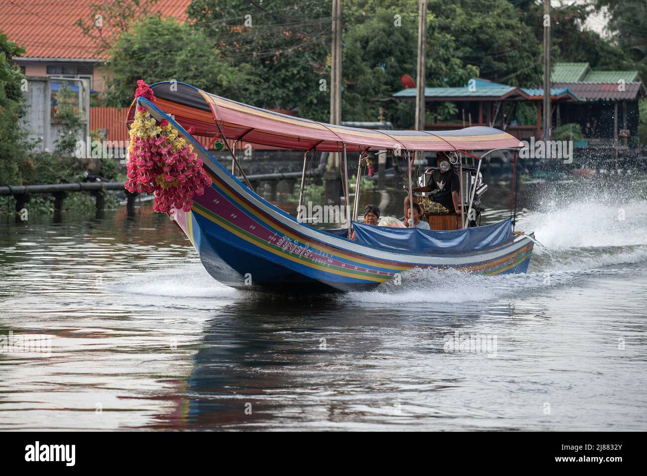 BANGKOK, THAILAND - DECEMBER 29, 2018: Traditional Thai motorboat on ...