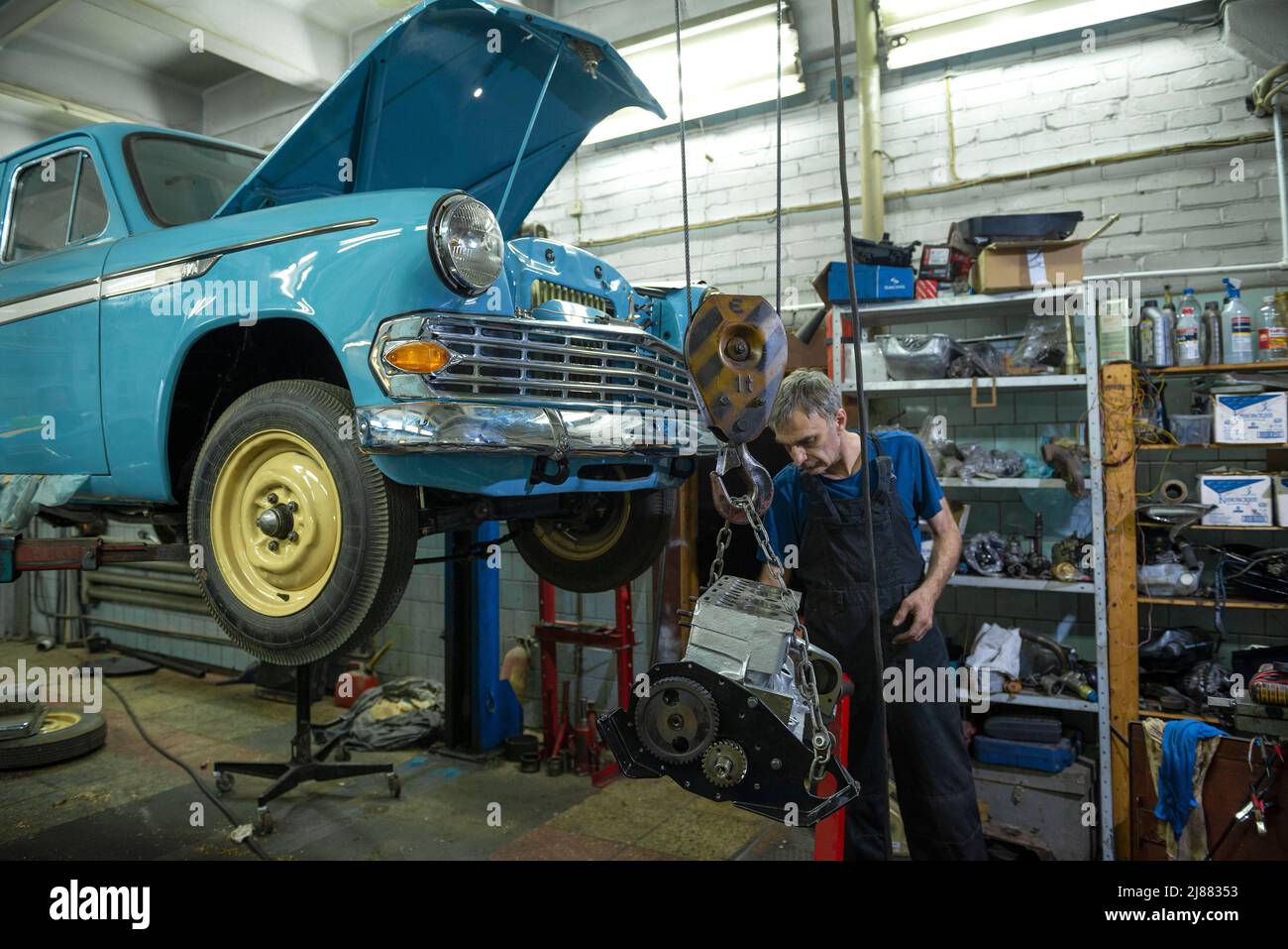 SAINT PETERSBURG, RUSSIA - AUGUST 03, 2020: Repair of Soviet retro car ...