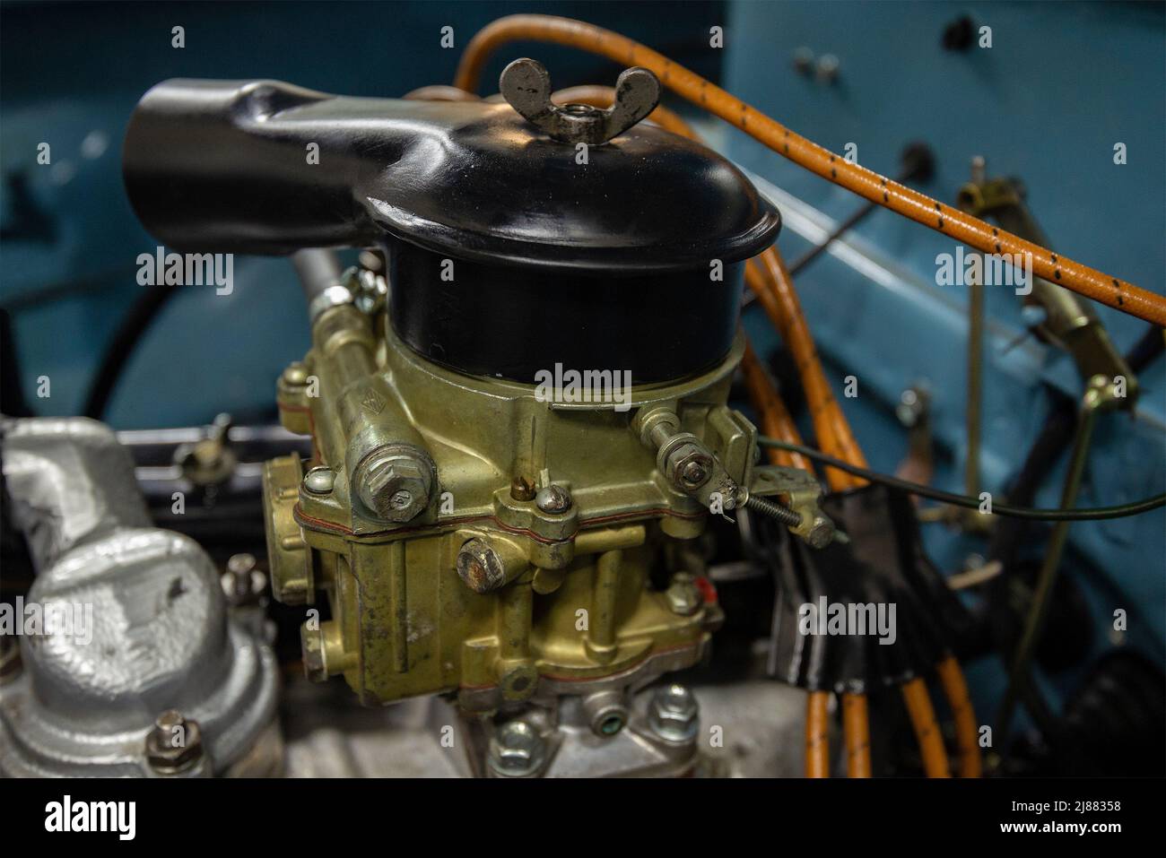 SAINT PETERSBURG, RUSSIA - AUGUST 06, 2020: Carburetor and air filter ...