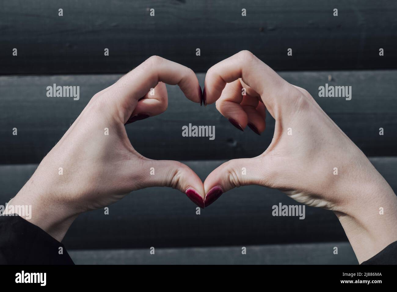 Perfect, nice, aged, old, pretty woman, showing heart figure with ...