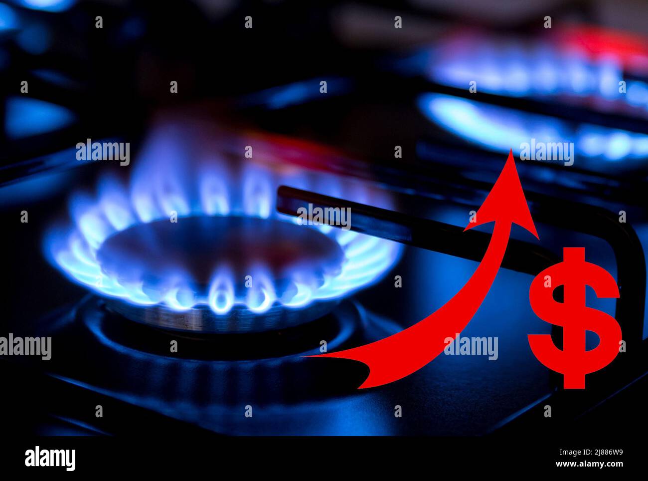 Gas burner on black modern kitchen stove with dollar sign Stock Photo ...