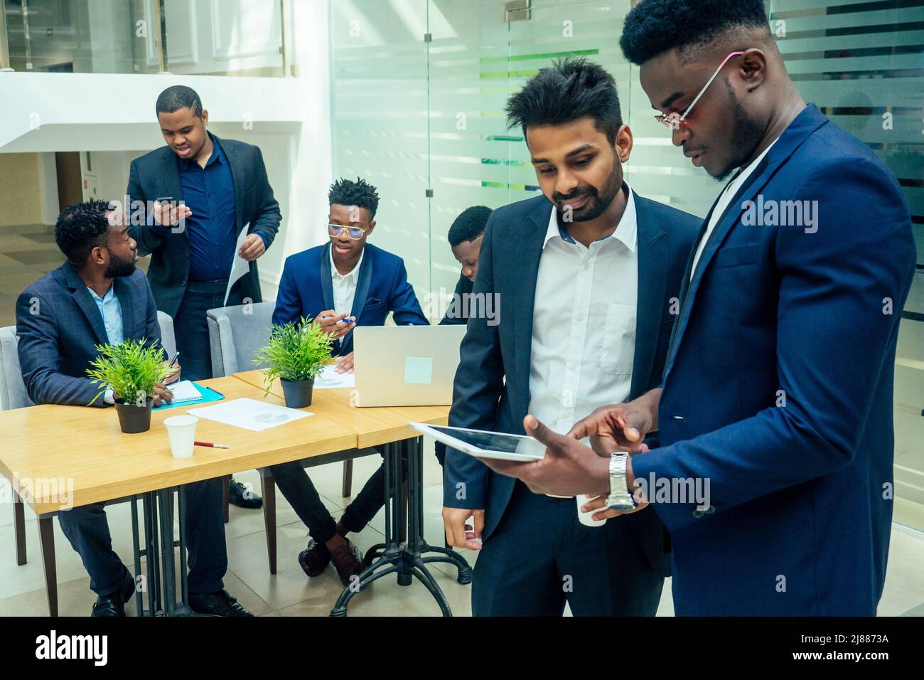 top view of team work high five a group of successful afro americans ...