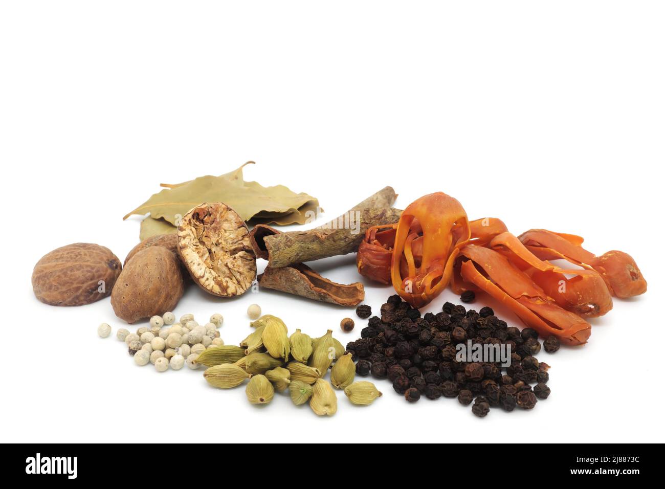 Different mix of aromatic spices isolated in white background ...