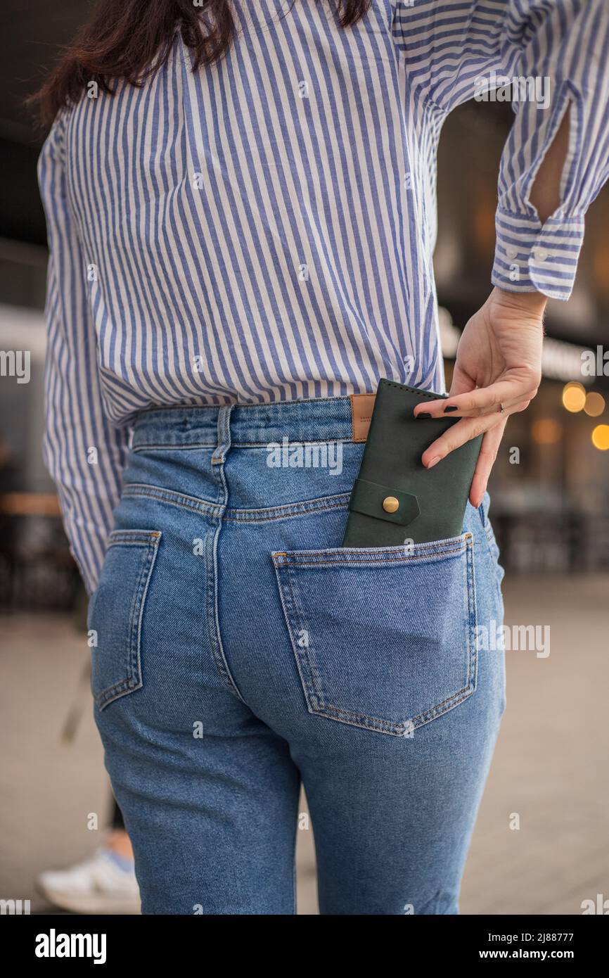 Money woman back pocket hi-res stock photography and images - Alamy