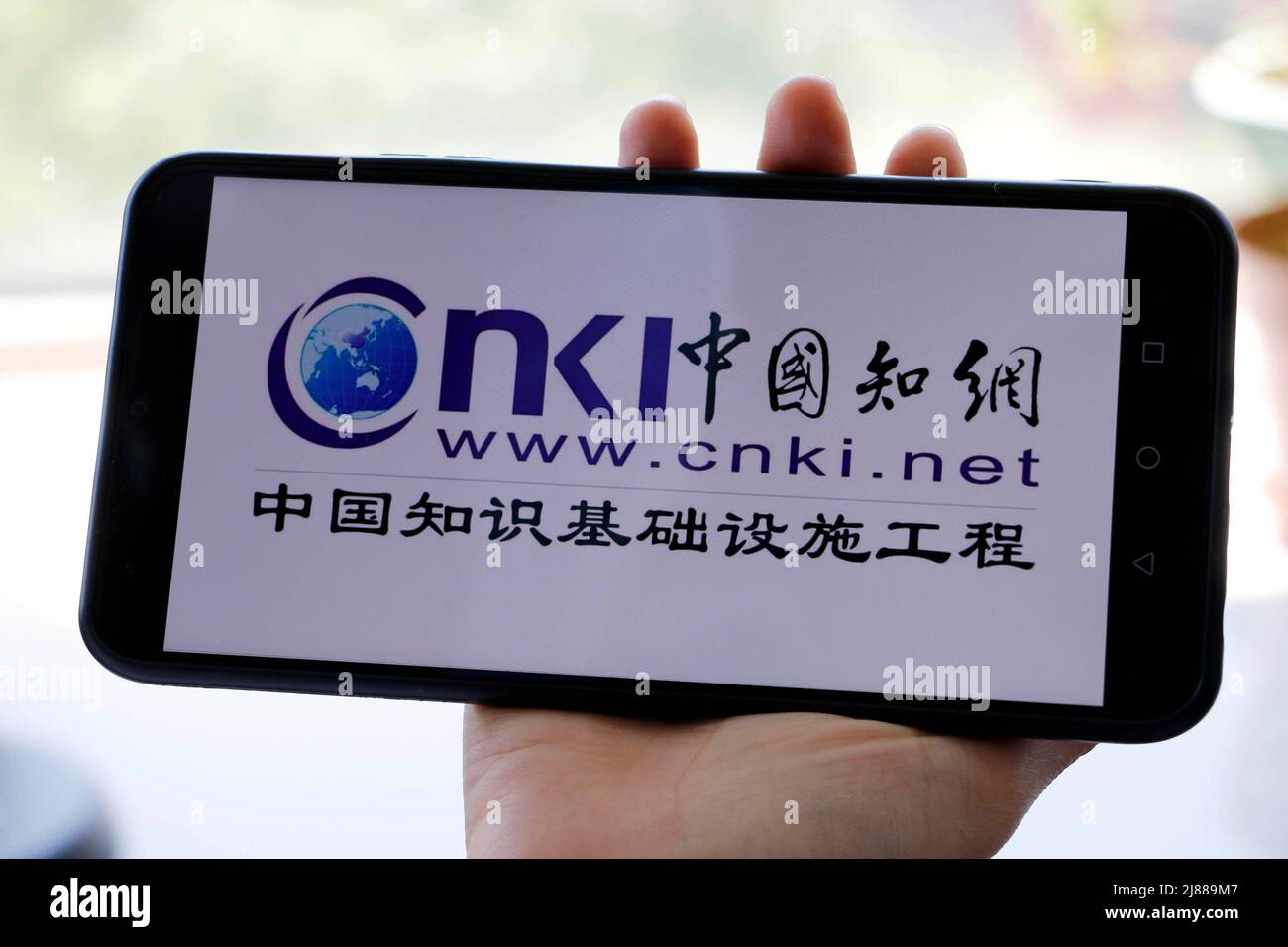 BEIJING, CHINA - MAY 14, 2022 - A resident browns a picture of the ...