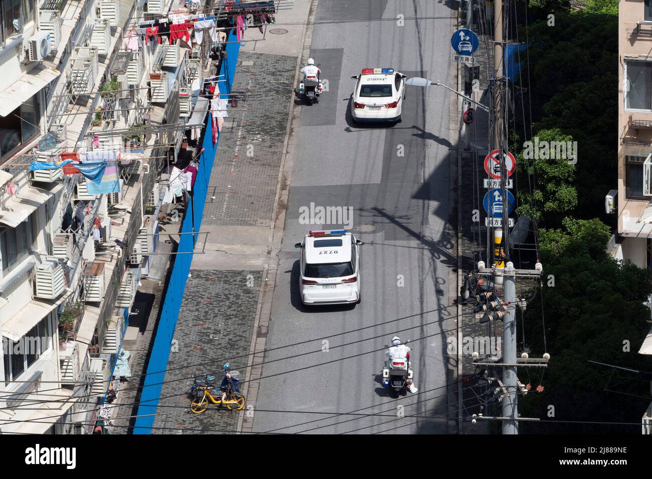 SHANGHAI, CHINA - MAY 14, 2022 - Police cars patrol a street in ...