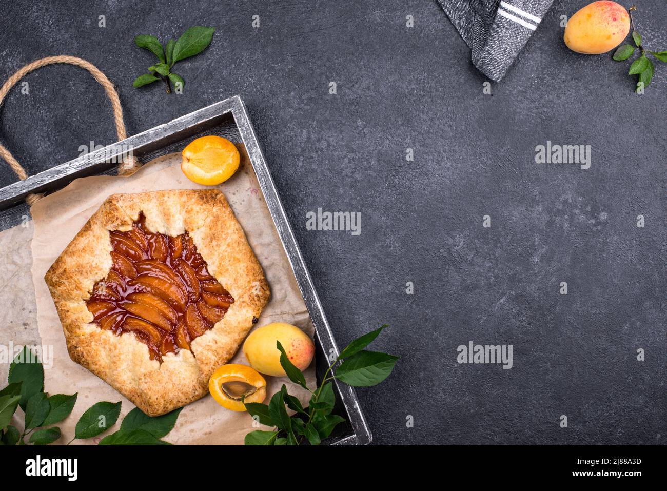 Sweet homemade galette pie with apricots Stock Photo - Alamy