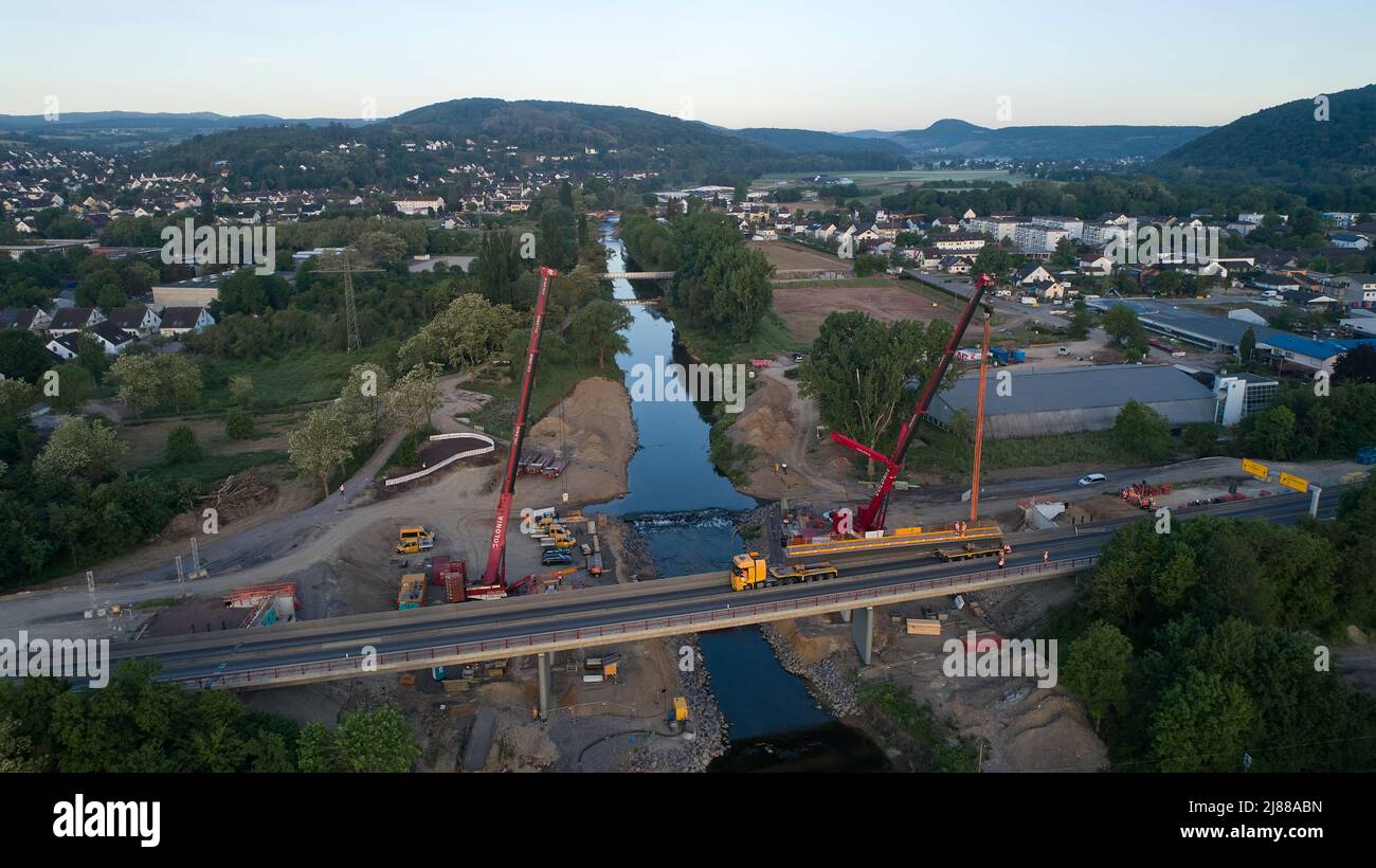 Sinzig, Germany. 14th May, 2022. Two truck-mounted cranes have begun ...