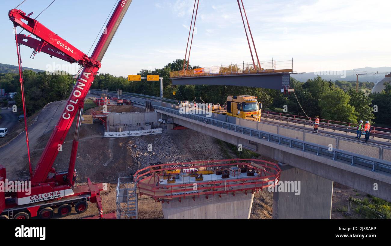 Sinzig, Germany. 14th May, 2022. Two truck-mounted cranes have begun ...