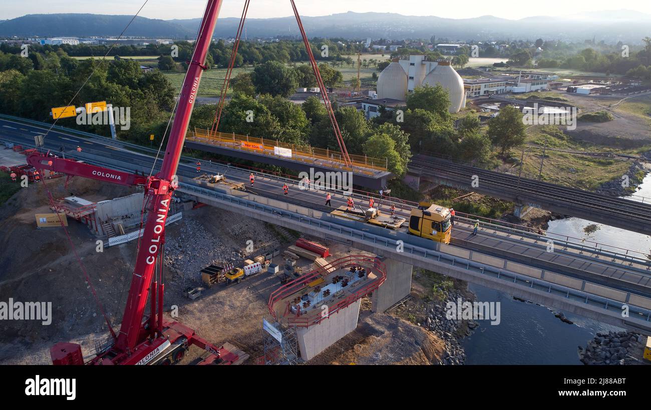 Sinzig, Germany. 14th May, 2022. Two truck-mounted cranes have begun ...