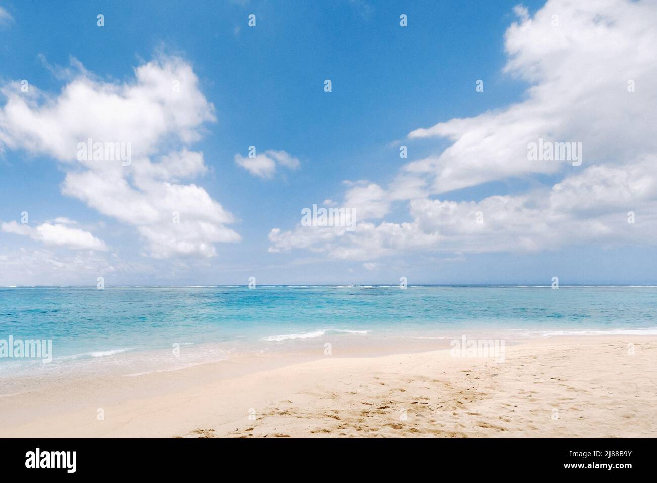 A view from a height of a Tropical beach and waves breaking on a ...