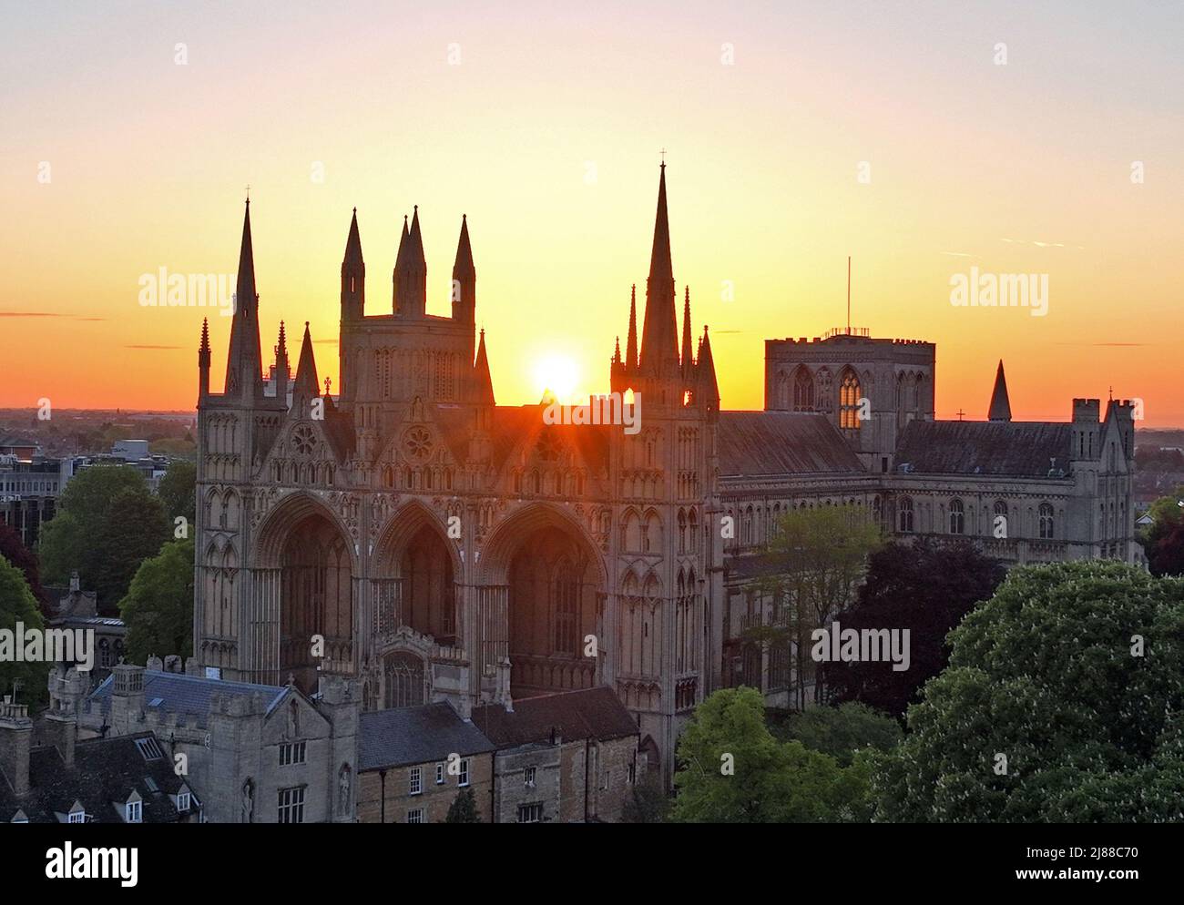 Peterborough, UK. 12th May, 2022. The sun rises behind Peterborough ...