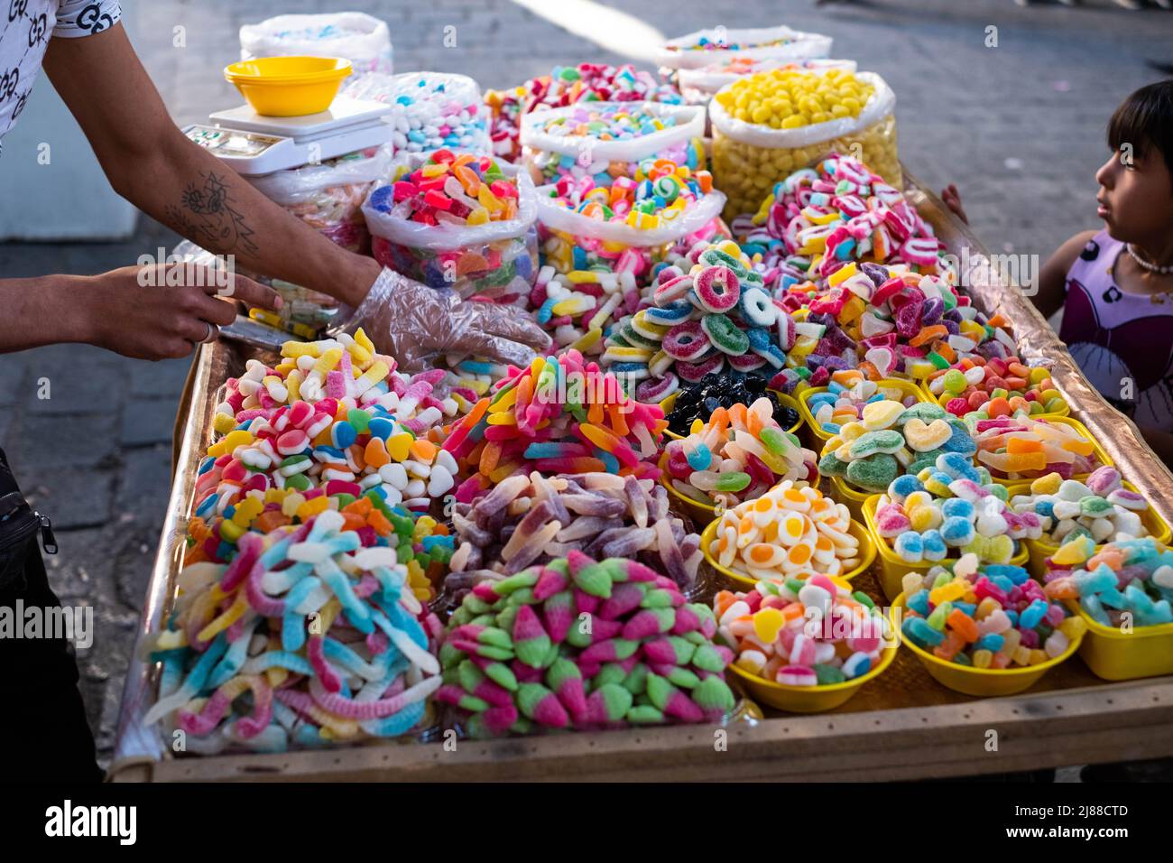 Damascus, Syria -May, 2022: Child buying sweets and candy on food ...
