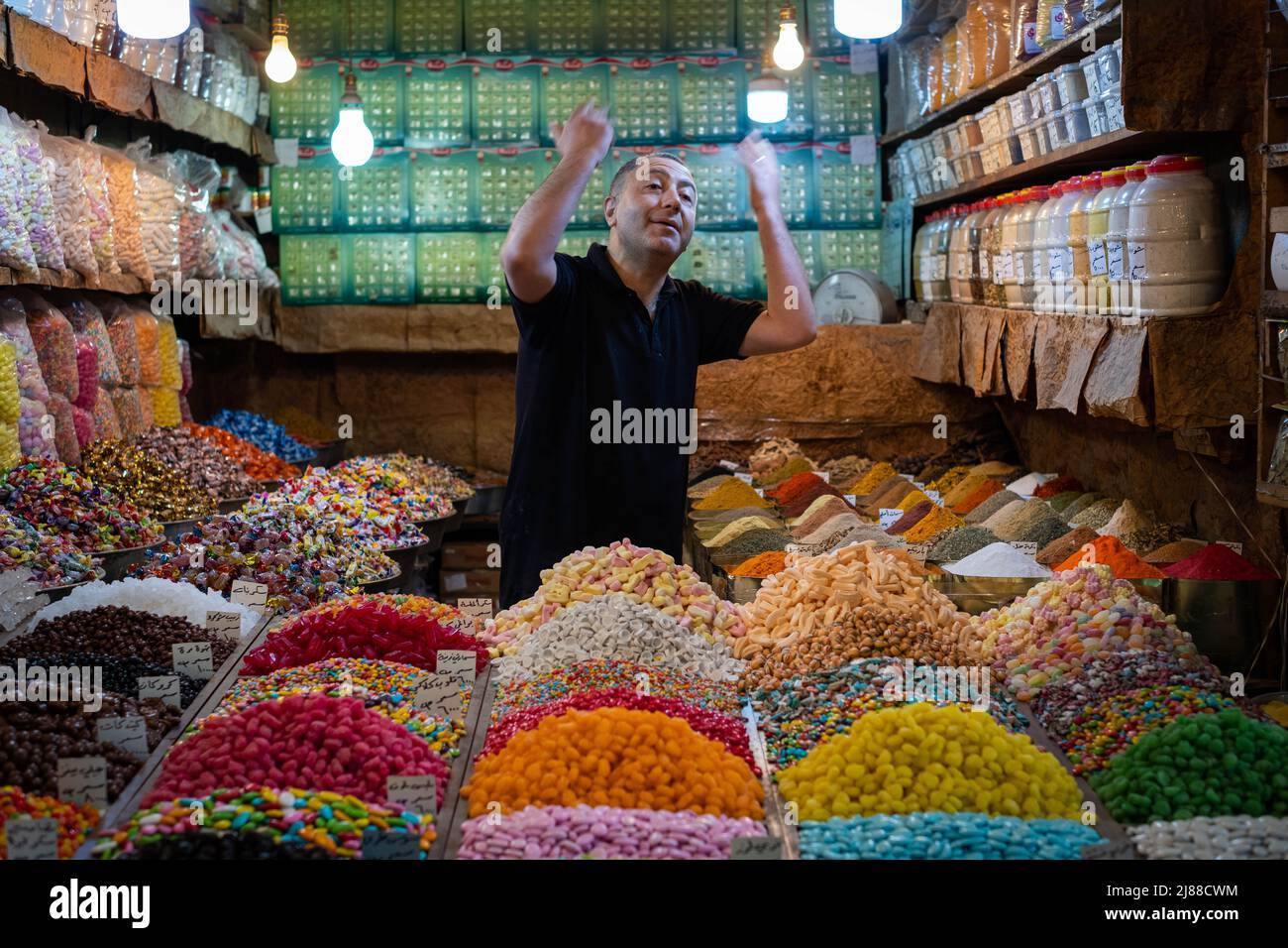 Damascus, Syria -May, 2022: Vendor selling sweets and gummy candies on ...
