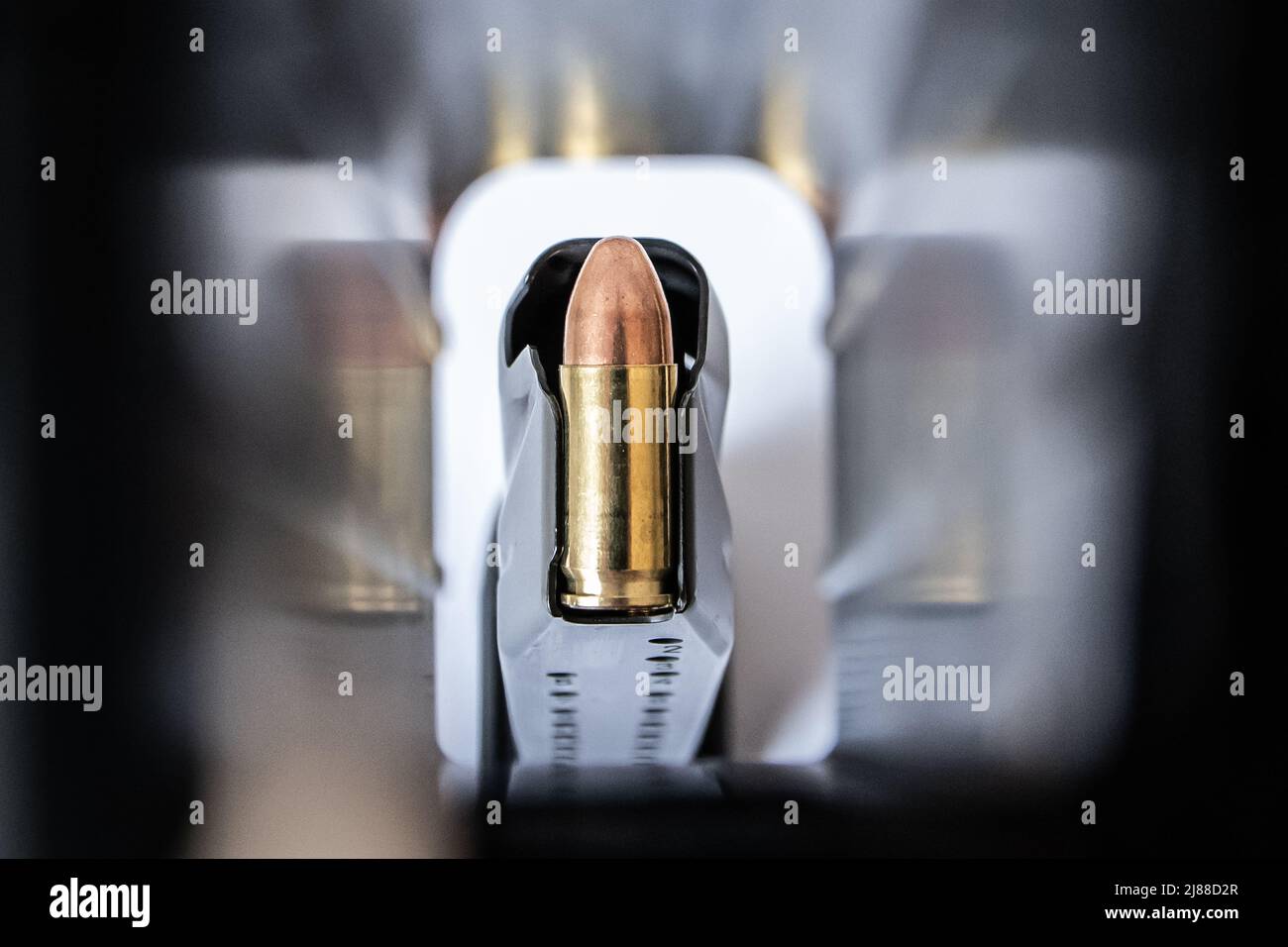 Rottweil, Germany. 13th May, 2022. A 9mm Luger cartridge is stuck in a ...