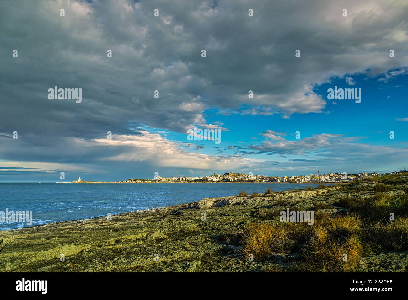 Landscape of the seaside town of Vieste from the bay of San Lorenzo ...