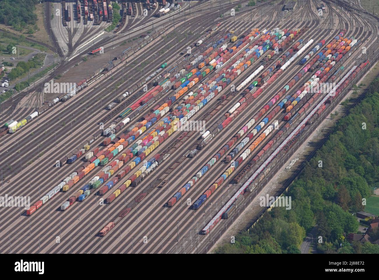 11 May 2022, Lower Saxony, Seevetal: Freight trains stand at the Maschen marshalling yard. The ...