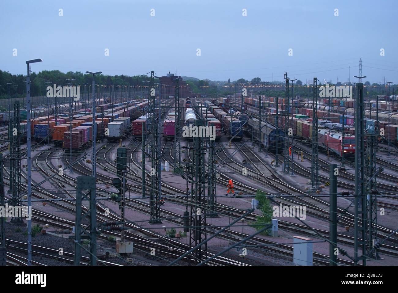 11 May 2022, Lower Saxony, Seevetal: Freight trains stand at the Maschen marshalling yard. The ...