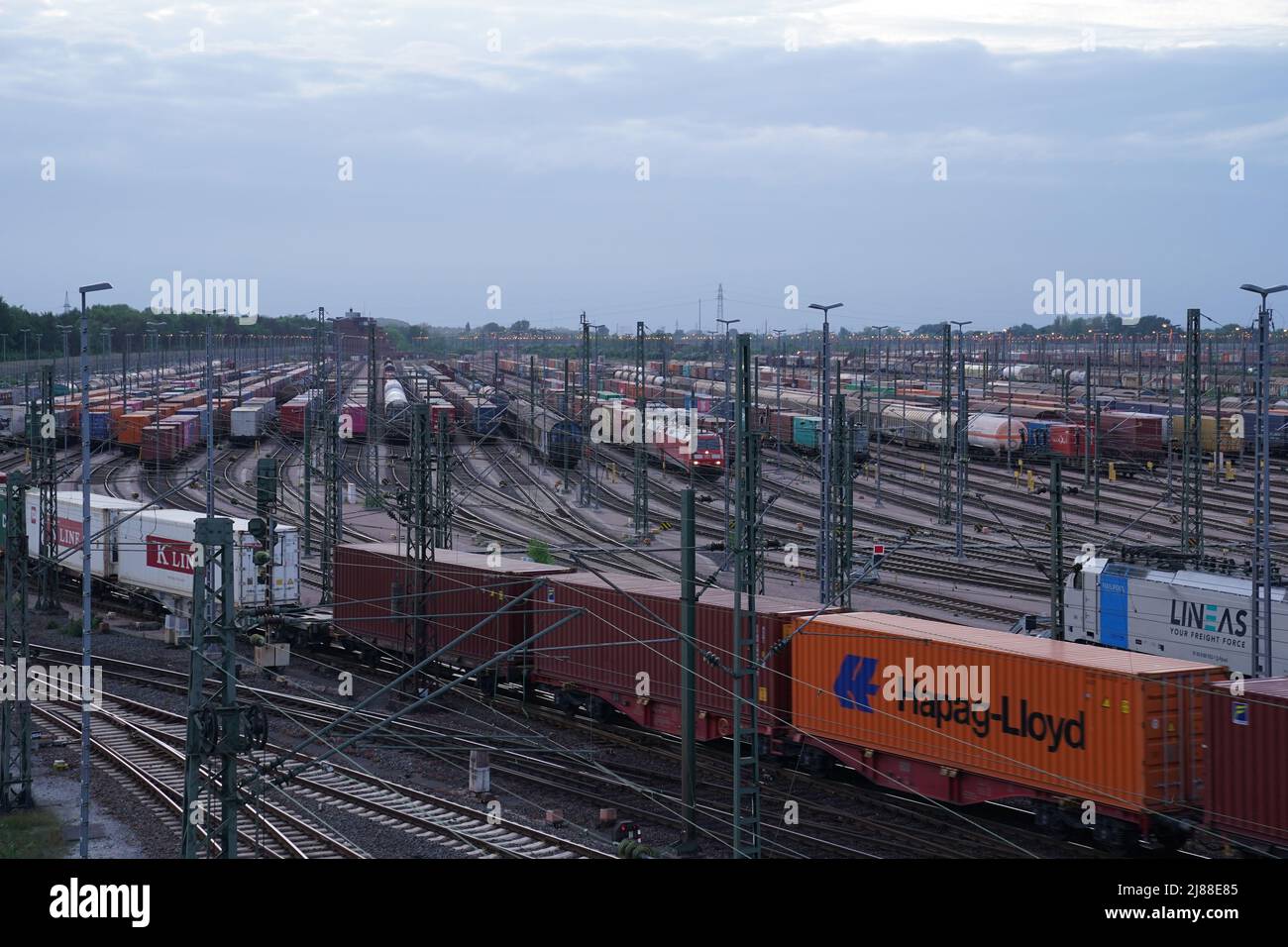11 May 2022, Lower Saxony, Seevetal: Freight trains stand at the Maschen marshalling yard. The ...