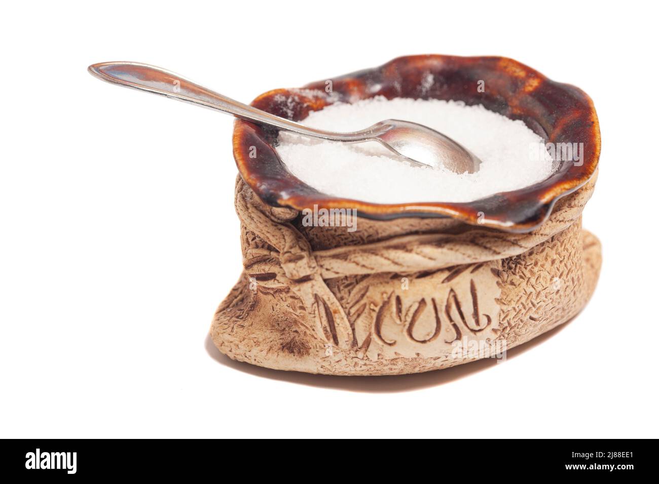 Bowl of white table salt isolated on white background Stock Photo - Alamy