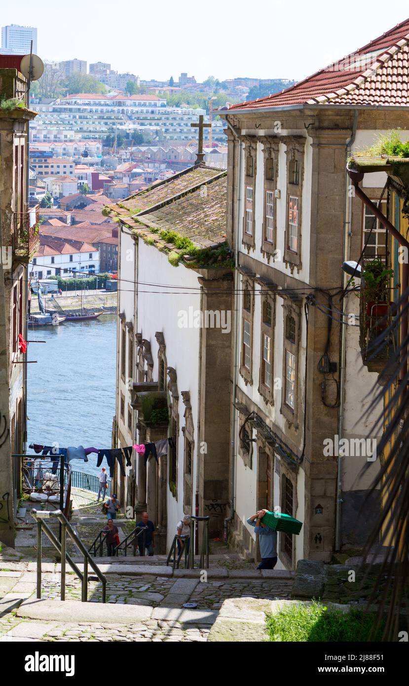 Narrow street in the old town of Porto (Ribeira district), Portugal ...