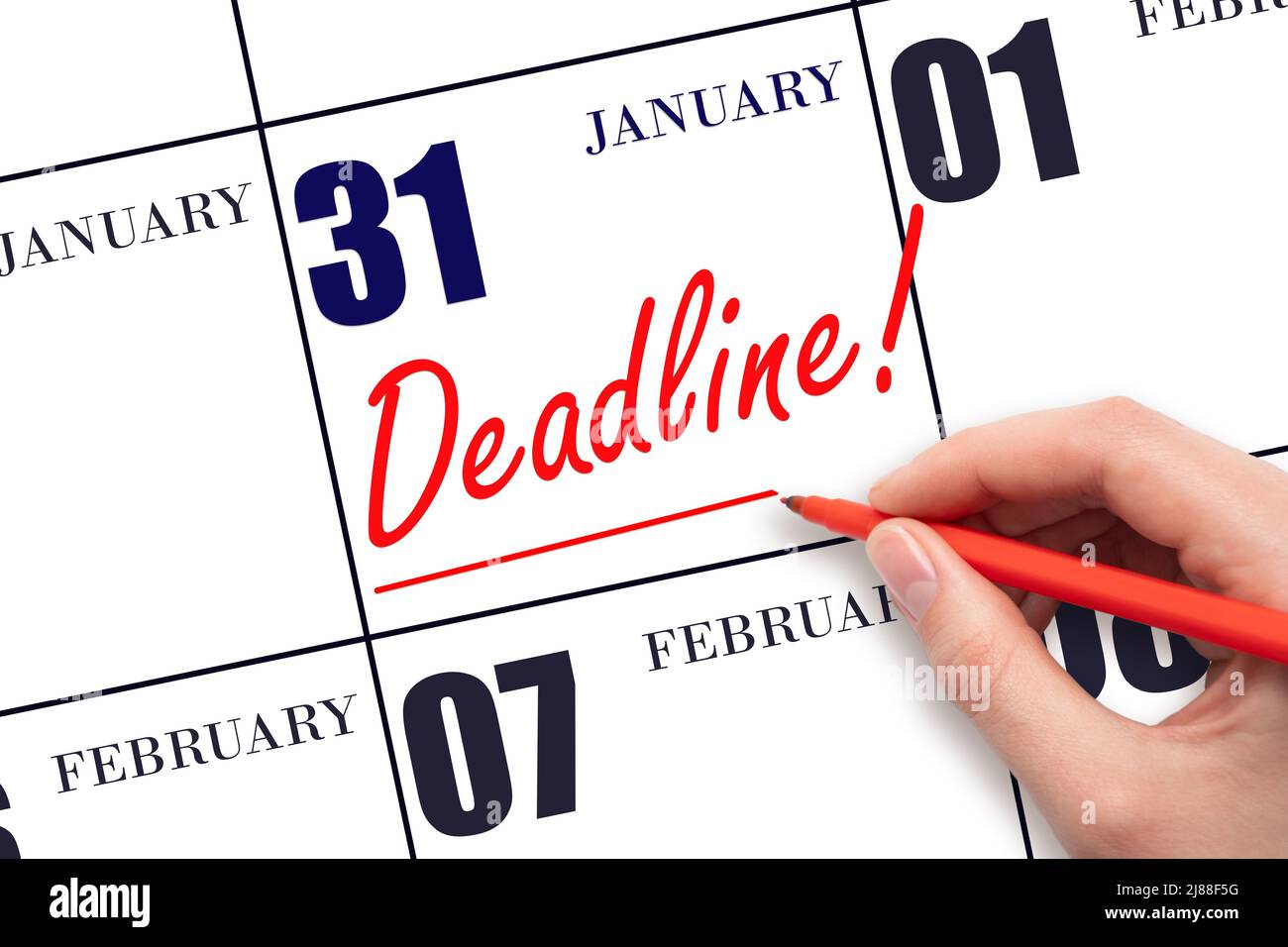 31st day of January. Hand drawing red line and writing the text ...