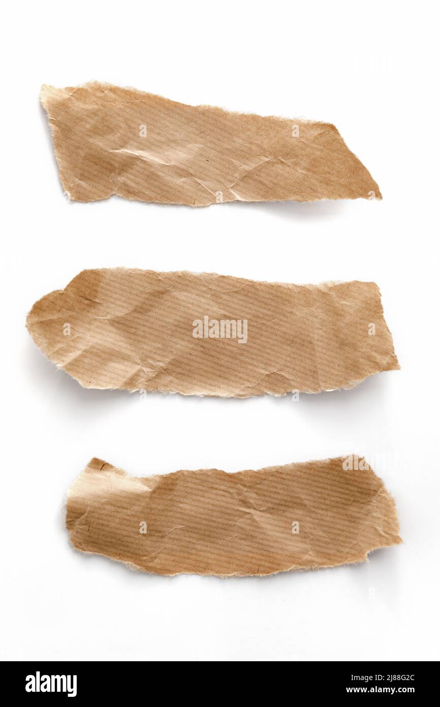 Recycled paper craft stick on white background Stock Photo - Alamy