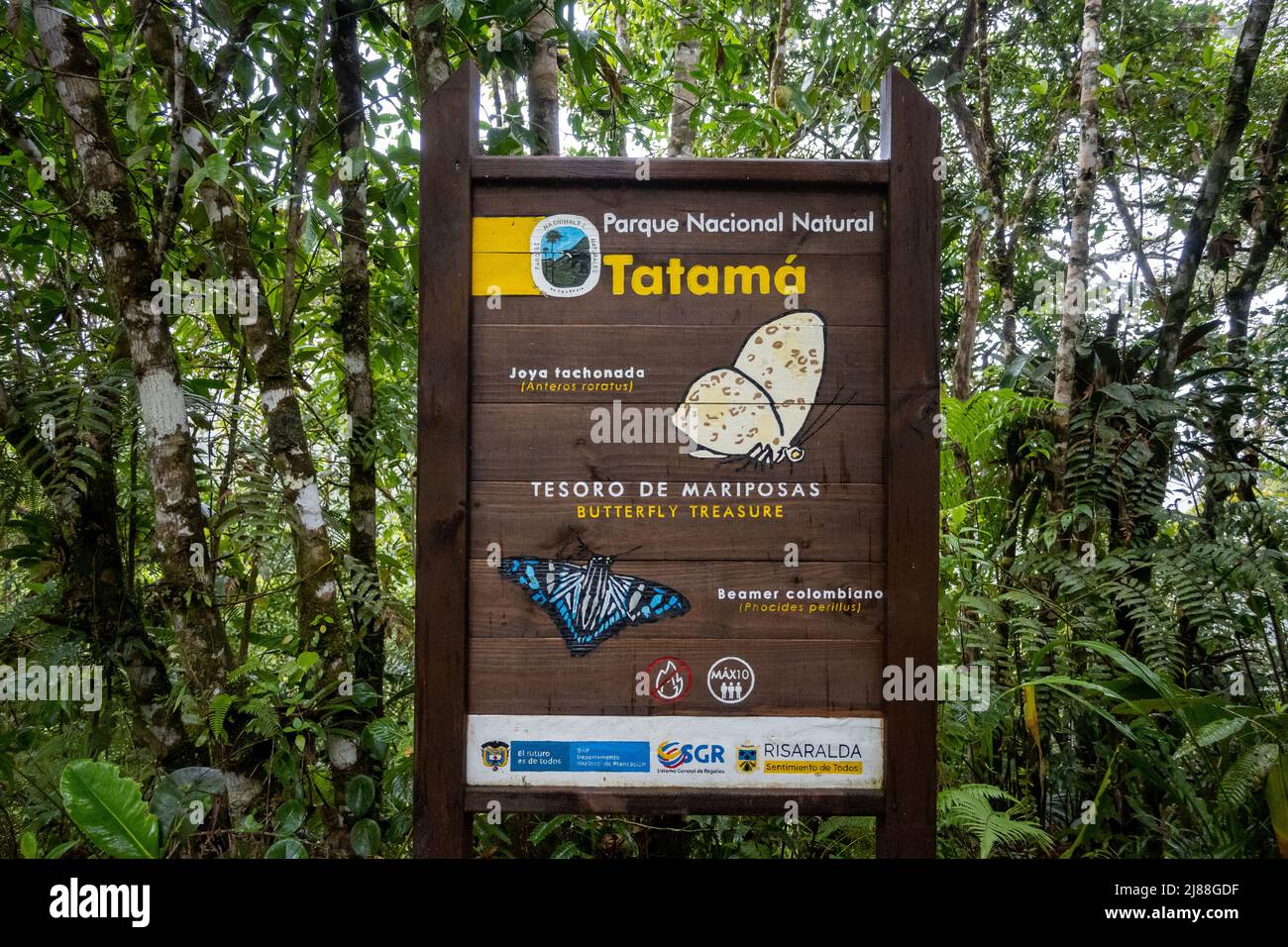 Colorful painted sign board at Tatama National Park. Colombia, South ...