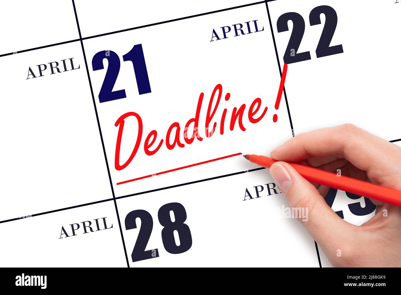 21st day of April. Hand drawing red line and writing the text Deadline ...