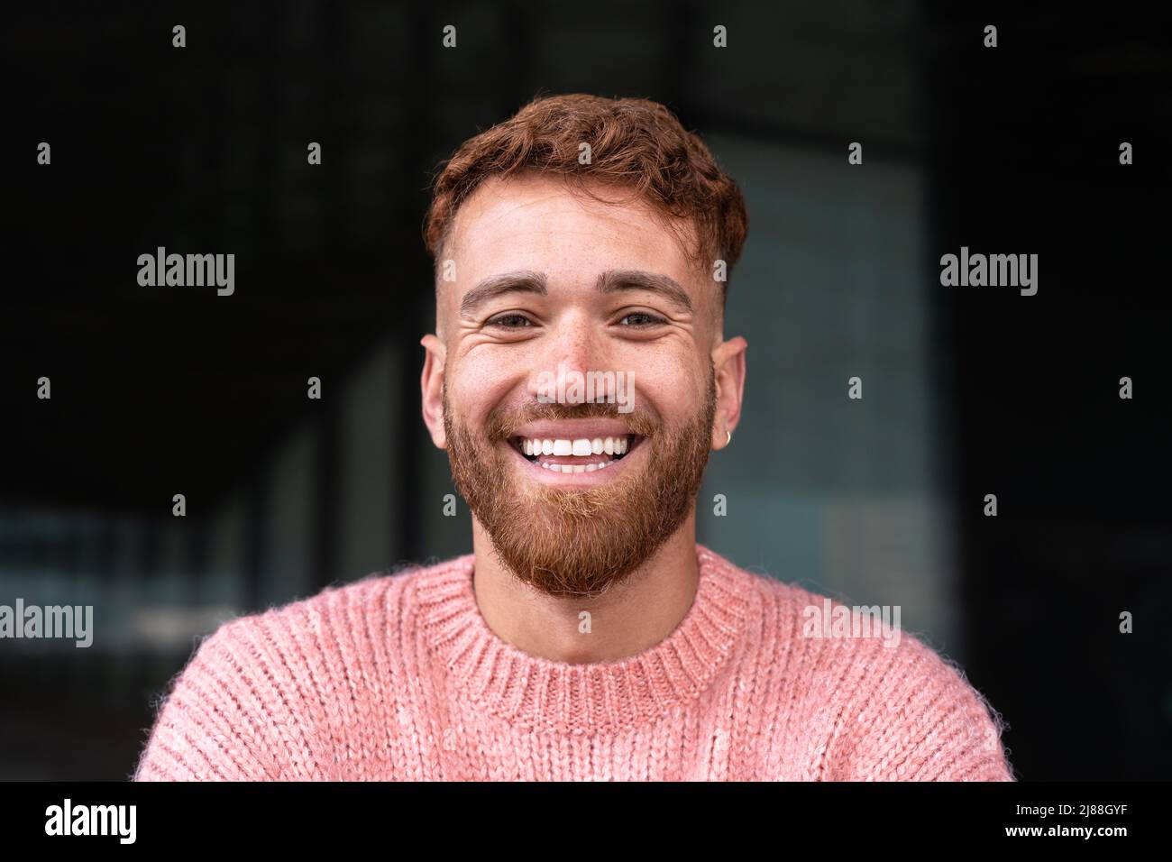 Portrait of happy man smiling in camera Stock Photo - Alamy