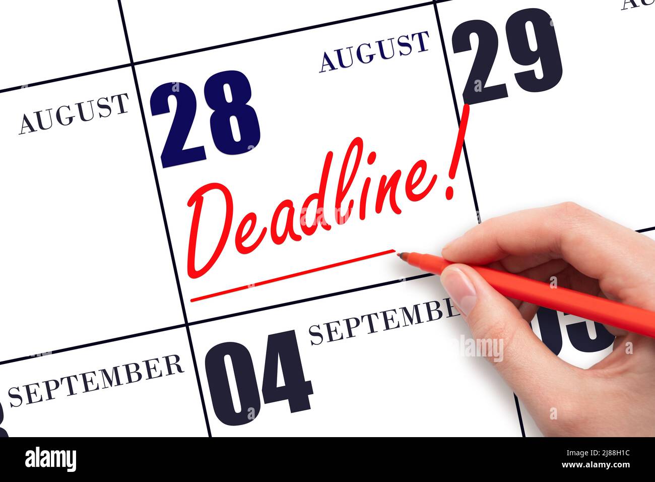 28th day of August. Hand drawing red line and writing the text Deadline ...