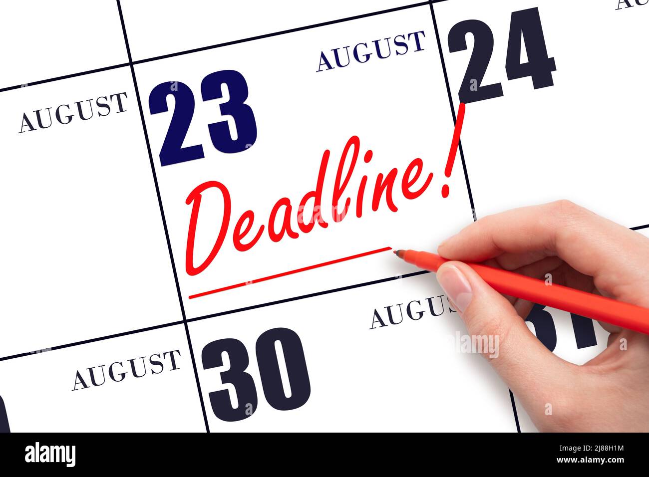 23rd day of August. Hand drawing red line and writing the text Deadline ...