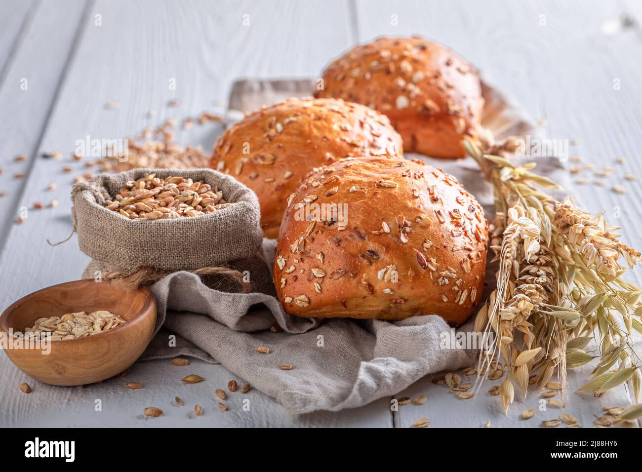Homemade and hot oat buns for tasty breakfast. Group of many buns Stock ...