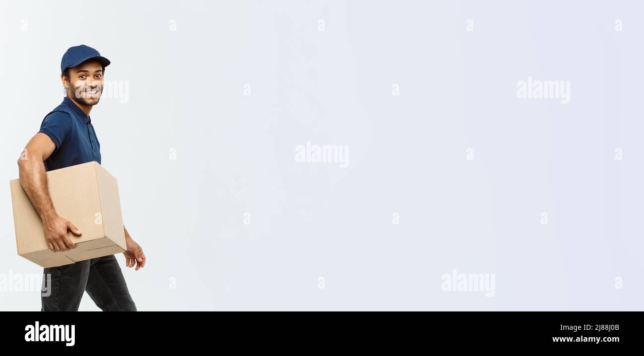 Delivery Concept - Portrait of Happy African American delivery man in ...