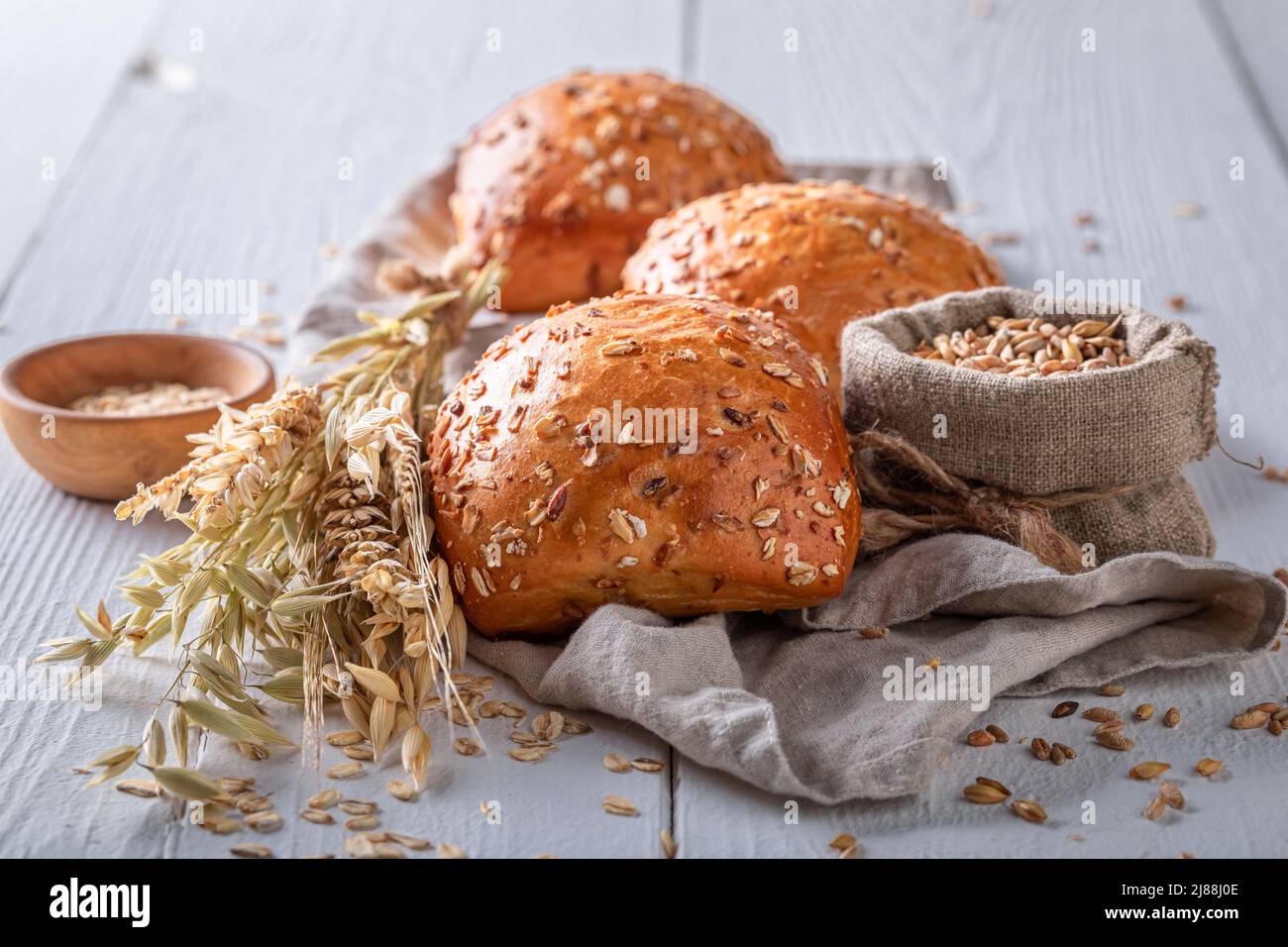 Homemade and hot oat buns baked in home bakery. Buns from the bakery ...