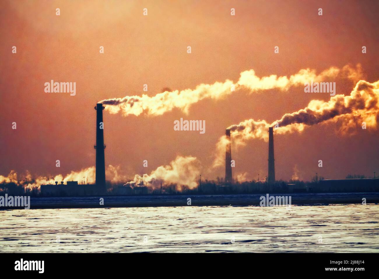 Immission. Smoky pipes and poisoned atmosphere and water of the ...