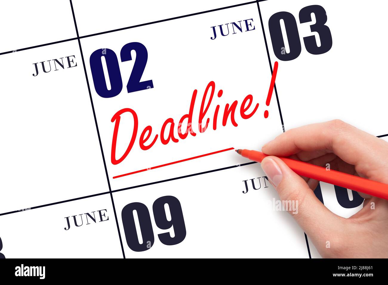 2nd day of June. Hand drawing red line and writing the text Deadline on ...