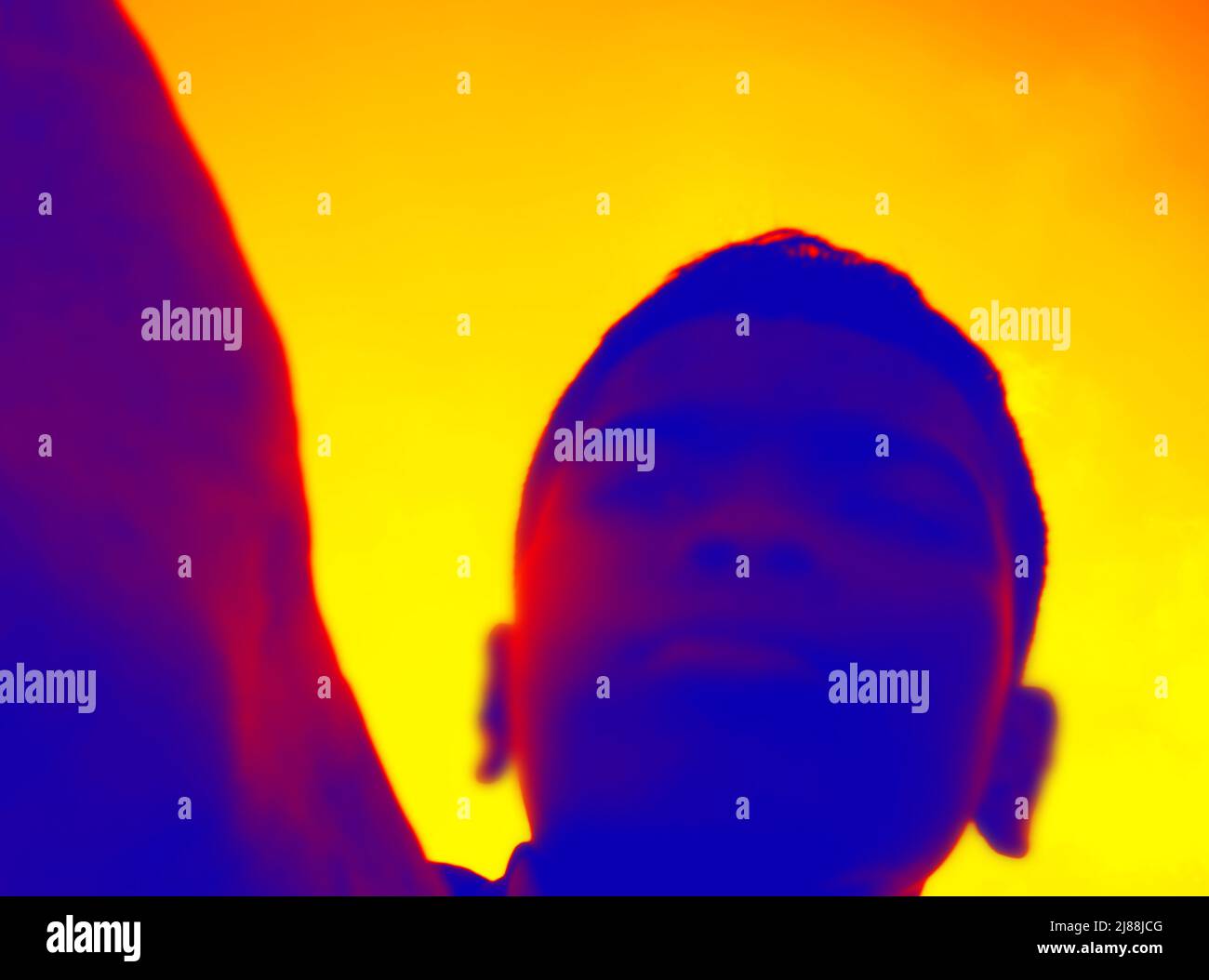 Portrait (head) of young men. Scanning the people's body temperature ...
