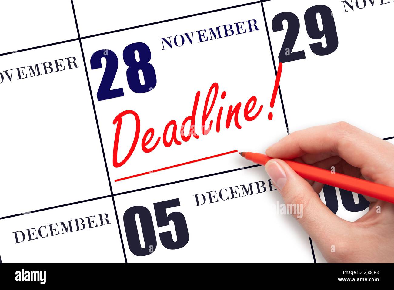 28th day of November. Hand drawing red line and writing the text ...