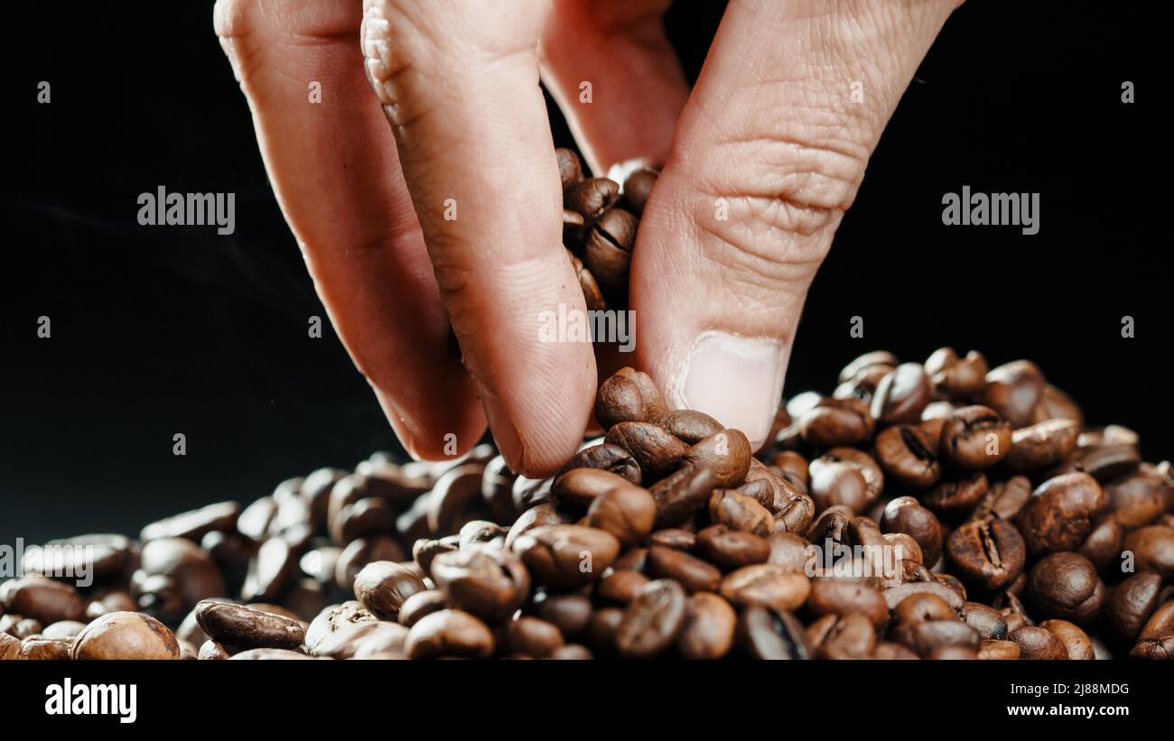 Hot coffee bean hand hi-res stock photography and images - Alamy